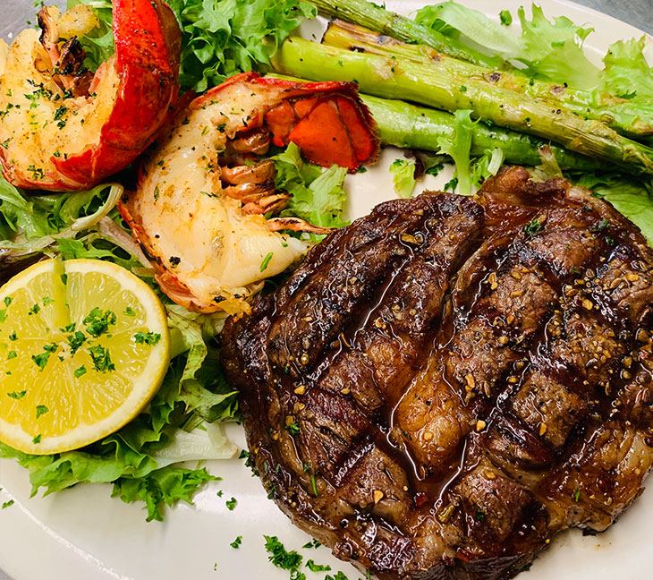 Rib Eye with Lobster Tail Platter – Seafood World – Online Order